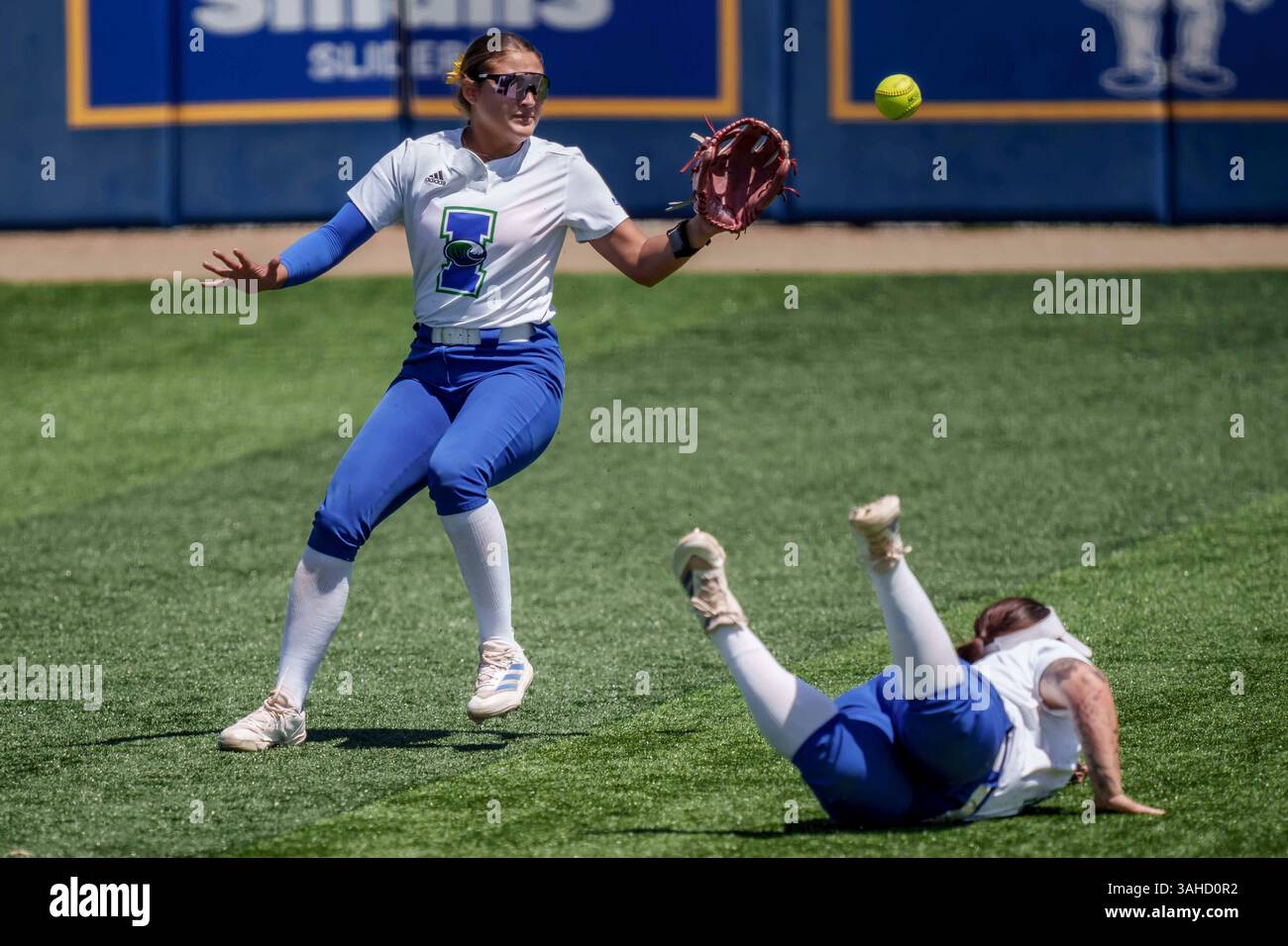 Texas A&M-Corpus Christi second baseman Mimi Thornton, right, dives but ...