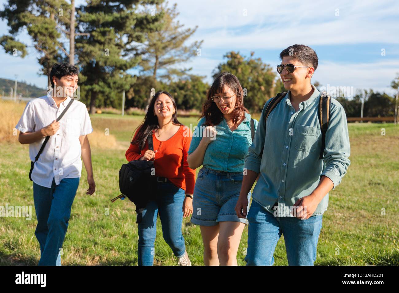 Diverse group walking together hi-res stock photography and images - Alamy