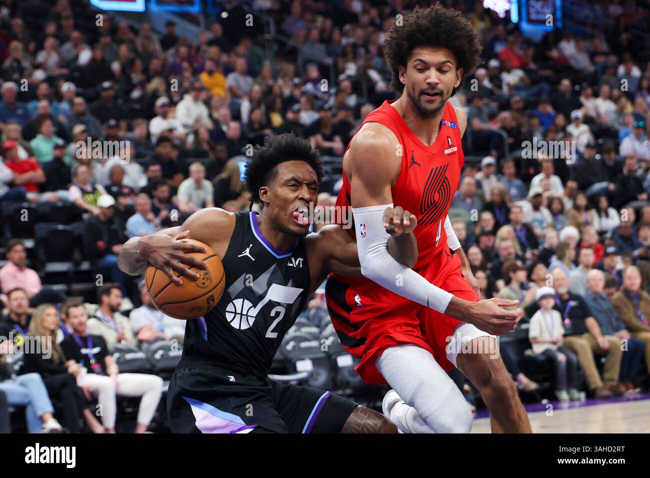 Utah Jazz guard Collin Sexton (2) dribbles against Portland Trail ...