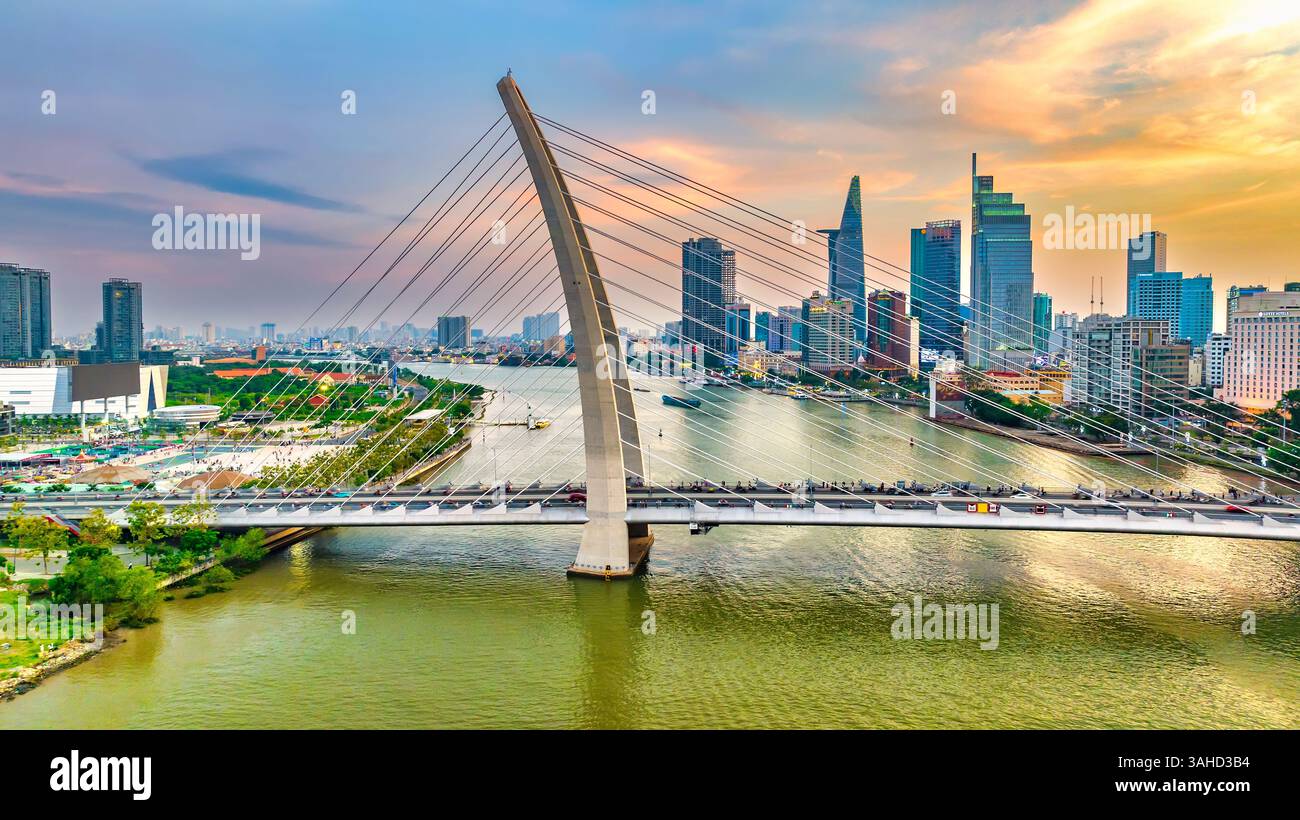 Beautiful sunset at Ba Son Bridge in downtown Ho Chi Minh City, Vietnam ...