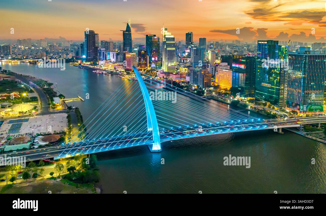 Beautiful sunset at Ba Son Bridge in downtown Ho Chi Minh City, Vietnam ...