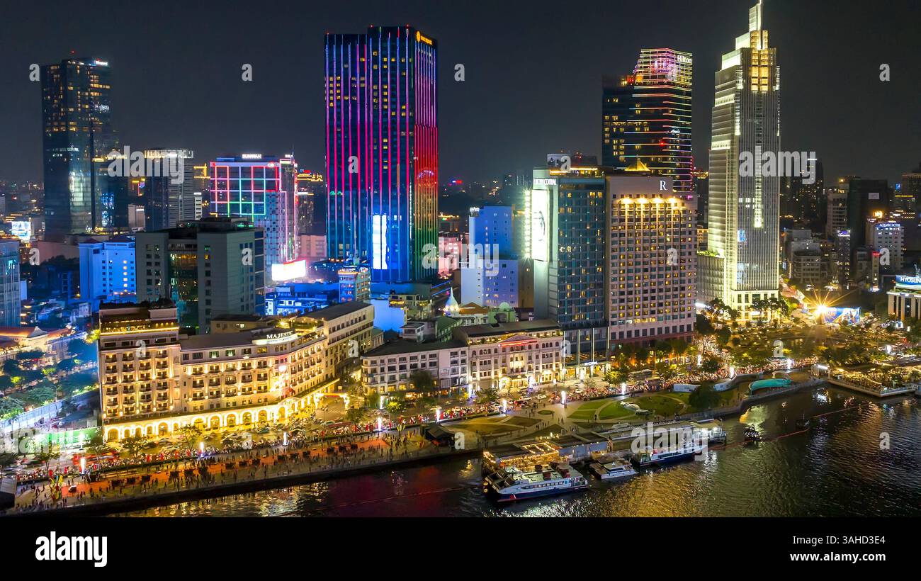 Aerial view of Ho Chi Minh City skyline and skyscrapers on Saigon river ...