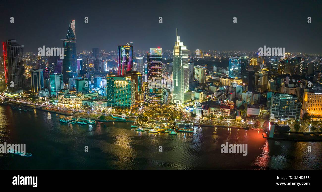Aerial view of Ho Chi Minh City skyline and skyscrapers on Saigon river ...