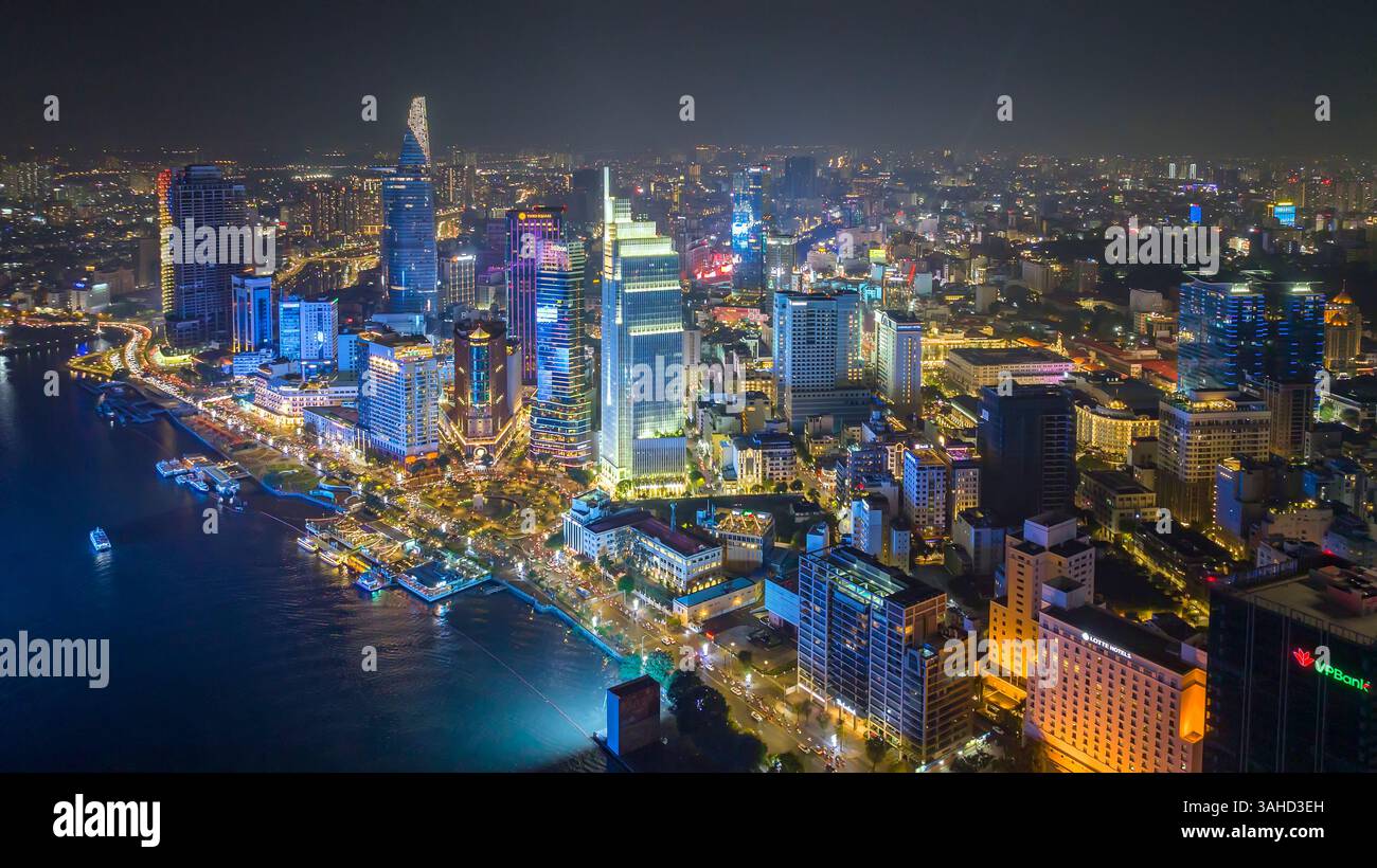 Aerial view of Ho Chi Minh City skyline and skyscrapers on Saigon river ...