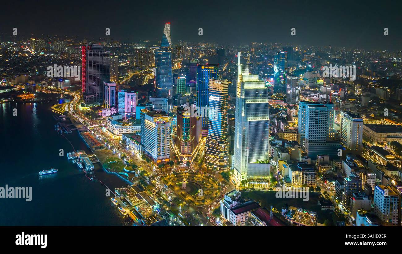 Aerial view of Ho Chi Minh City skyline and skyscrapers on Saigon river ...