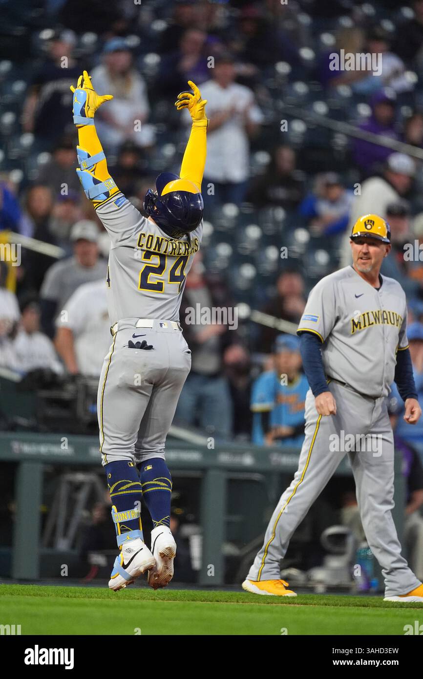 Milwaukee Brewers' William Contreras, left, celebrates as he circles ...