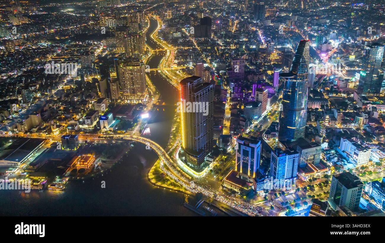 Aerial view of Ho Chi Minh City skyline and skyscrapers on Saigon river ...