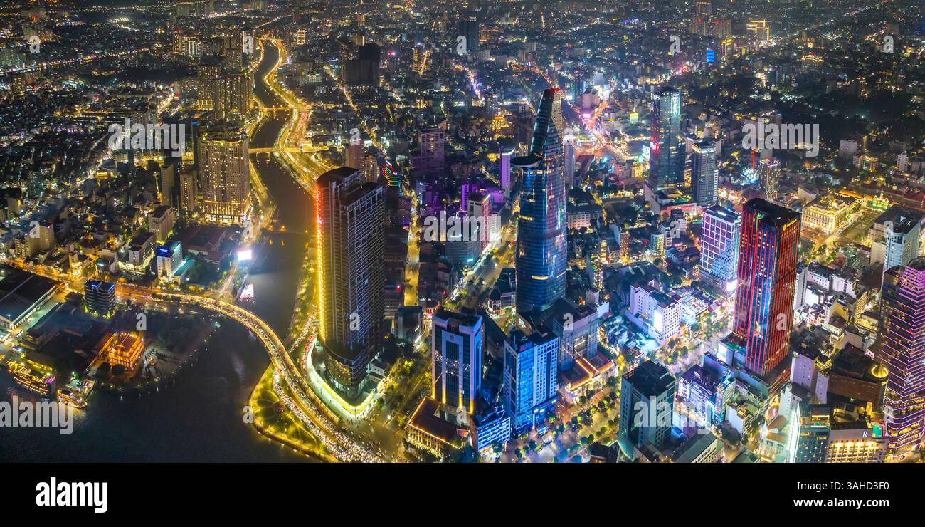 Aerial view of Ho Chi Minh City skyline and skyscrapers on Saigon river ...