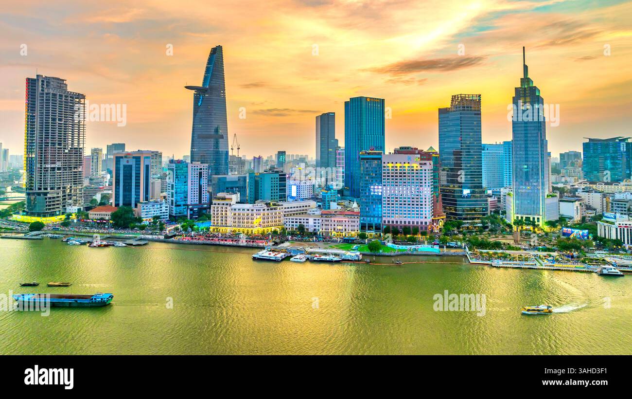 Beautiful sunset at skyscrapers along river light smooth down urban ...