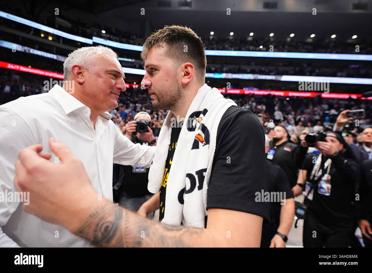 Los Angeles Lakers' Luka Doncic, right, hugs his father Sasa Doncic ...