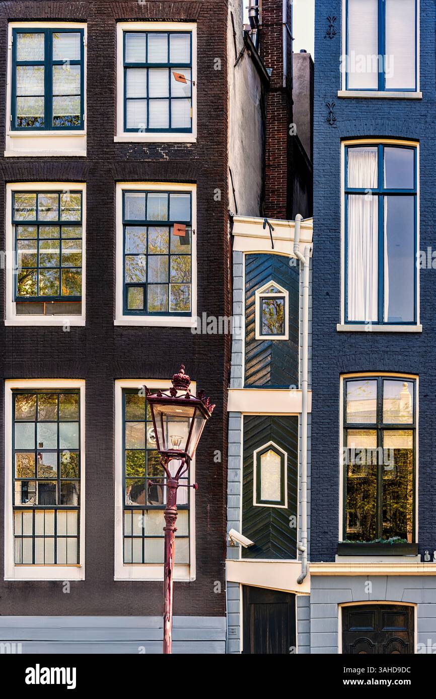 Very small narrow house by the canal in Amsterdam, the Netherlands ...