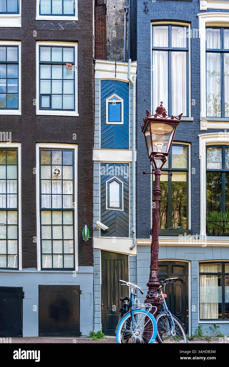 Very small narrow house by the canal in Amsterdam, the Netherlands ...