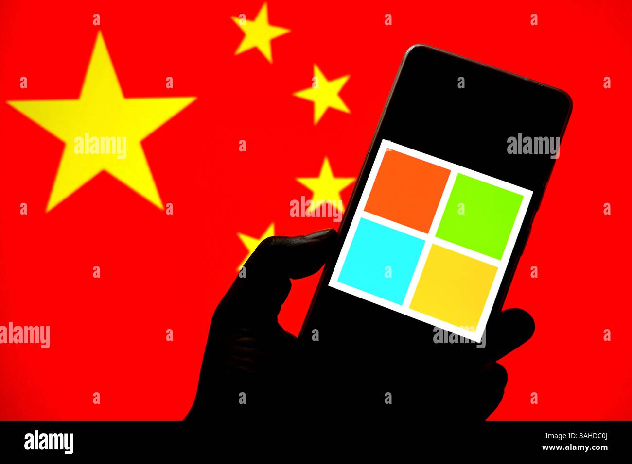 In this photo illustration, a Microsoft logo is seen displayed on a ...