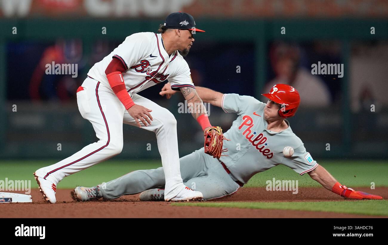 Philadelphia Phillies' J.T. Realmuto (10) slides safe against Atlanta ...