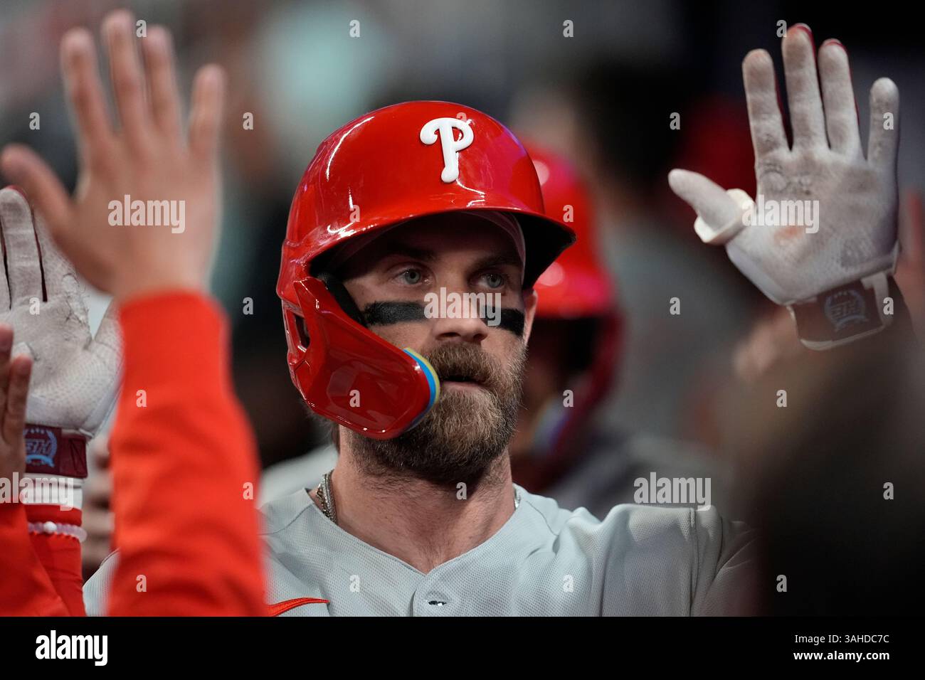 Philadelphia Phillies' Bryce Harper (3) celebrates his two-run homer ...