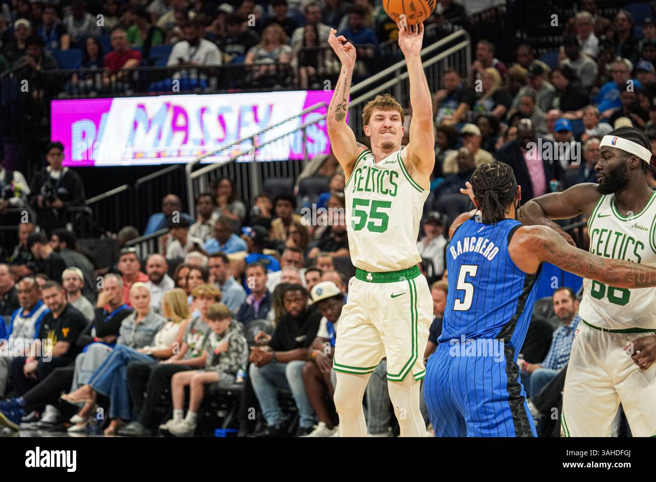 Orlando, Florida, USA, April 9, 2025, Boston Celtics guard Baylor Scheierman #55 shoots a three ...