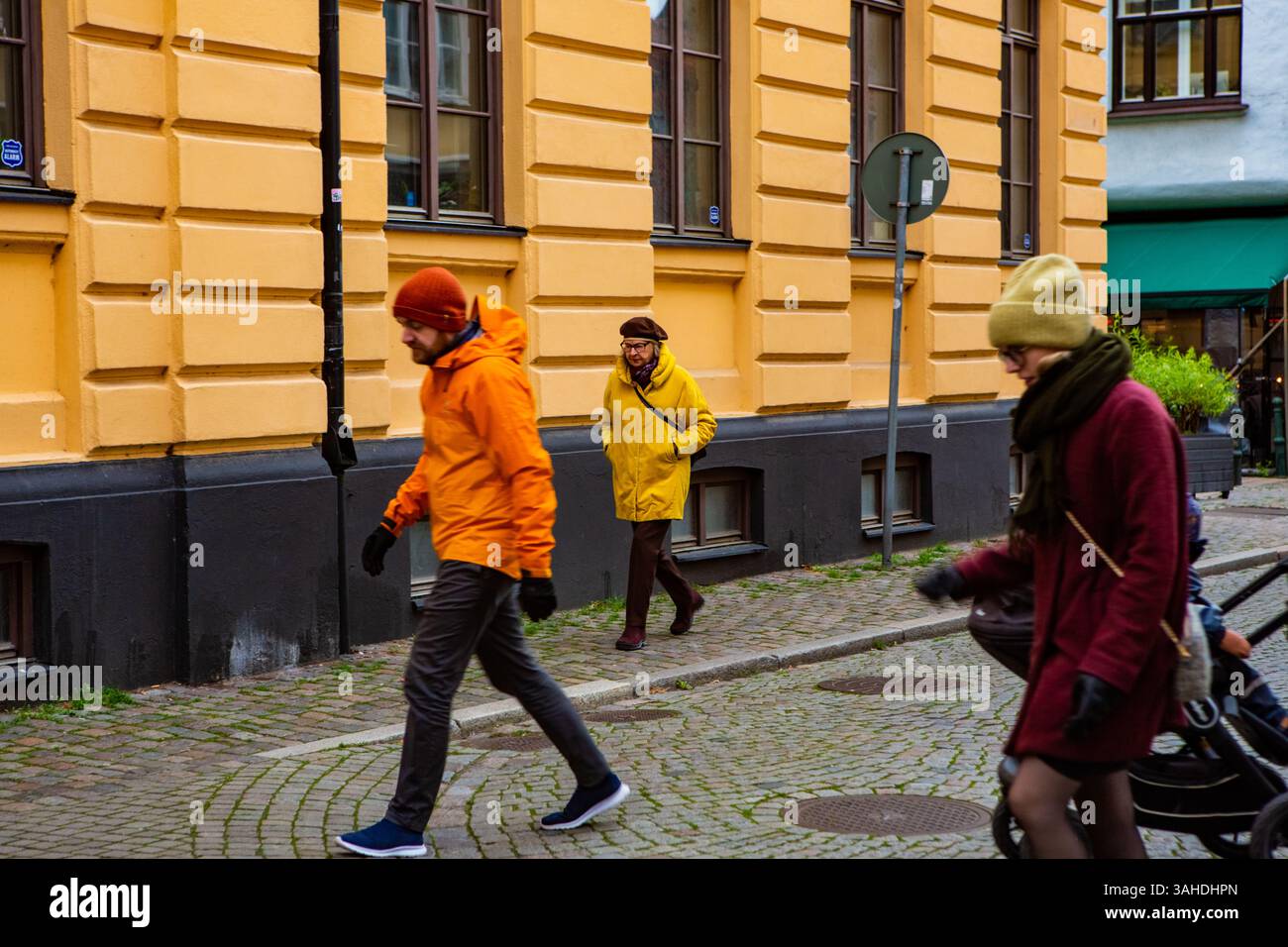 People waling on street in colorful Gamla Vaster, Malmo, Sweden Stock ...