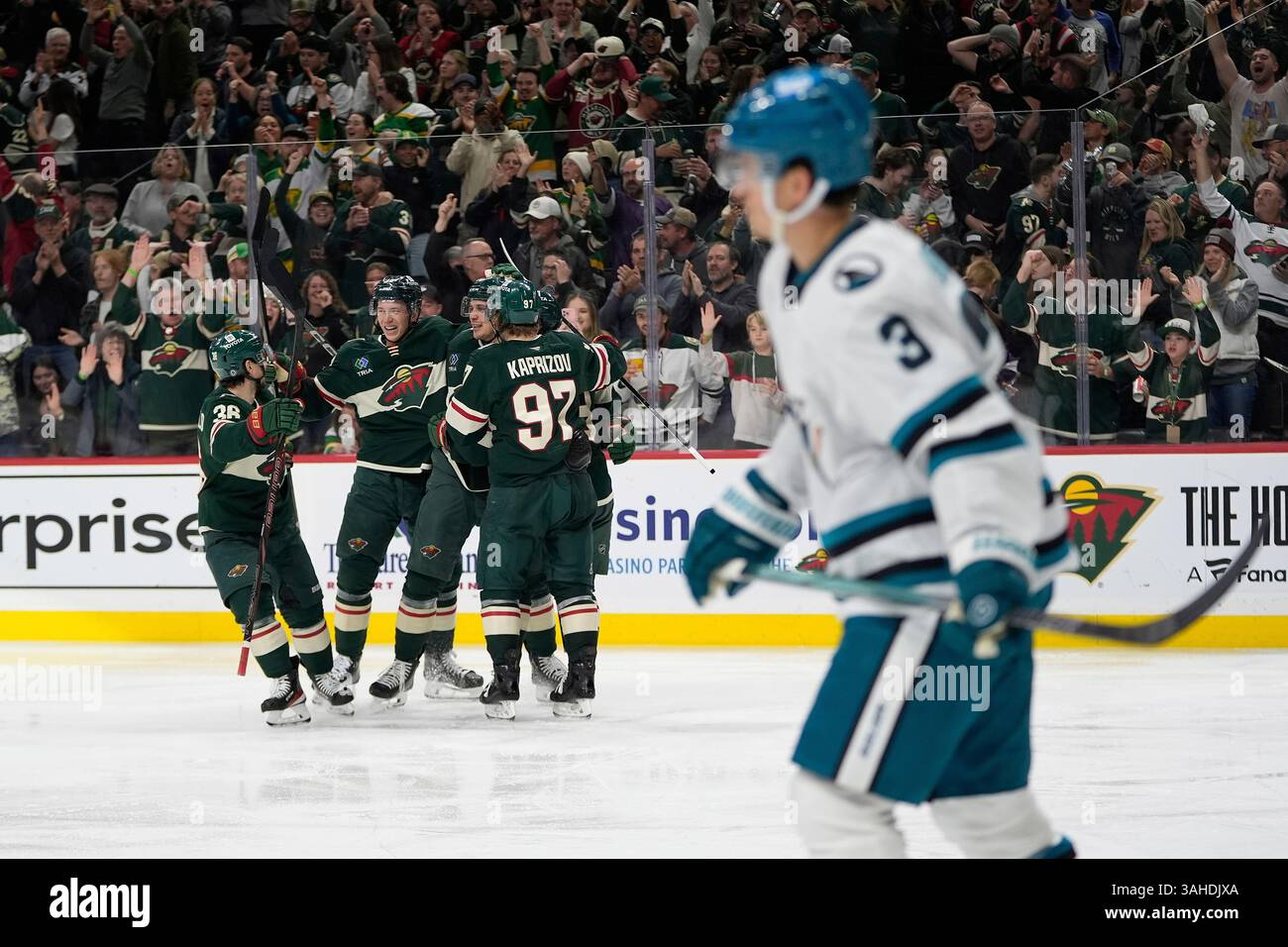 Minnesota Wild center Joel Eriksson Ek (14), middle, celebrates with ...