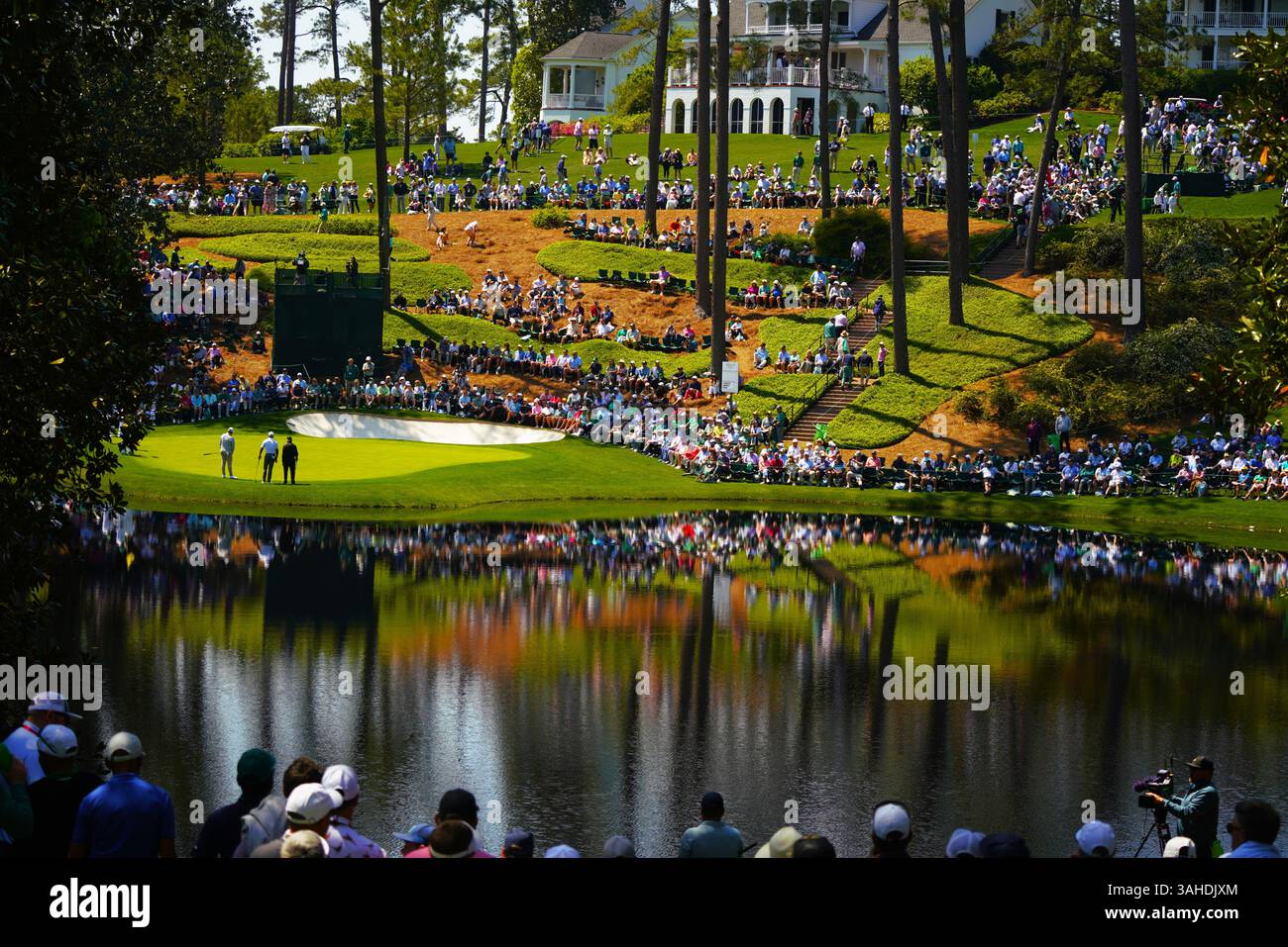 Augusta, USA. 9th Apr, 2025. Spectators watch the par 3 contest of the ...