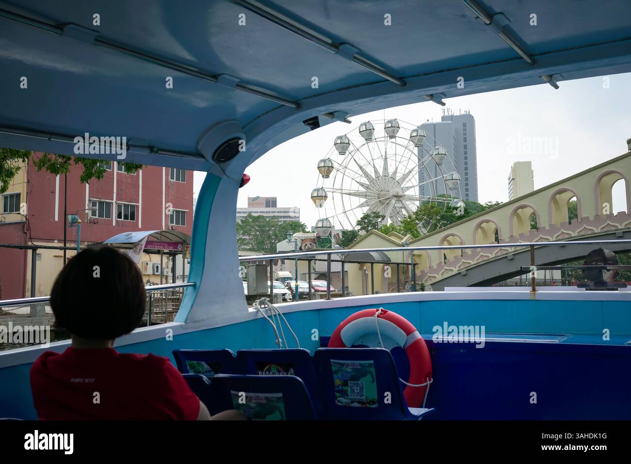 Melaka, Malaysia - Mar 26, 2025: View of Melaka city from boat ride of ...