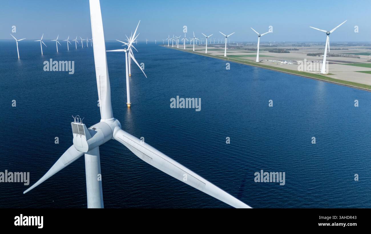 Expansive view of an offshore windmill park in the Netherlands ...