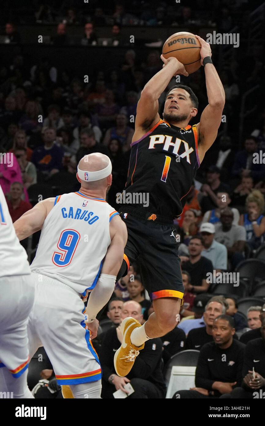Phoenix Suns guard Devin Booker (1) shoots over Oklahoma City Thunder ...