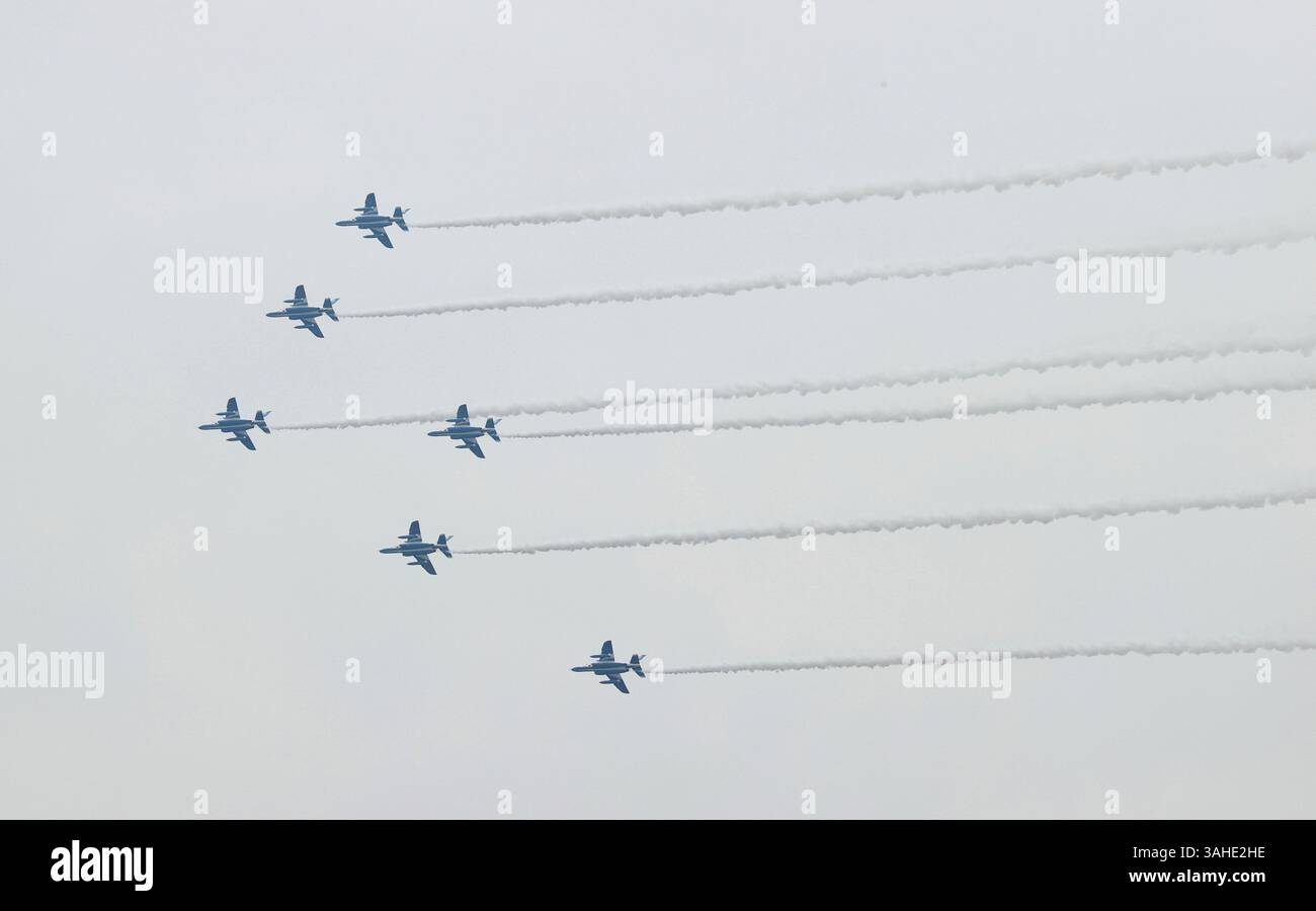 Six Blue Impulse aircraft of the Japan Air Self-Defense Force fly over ...