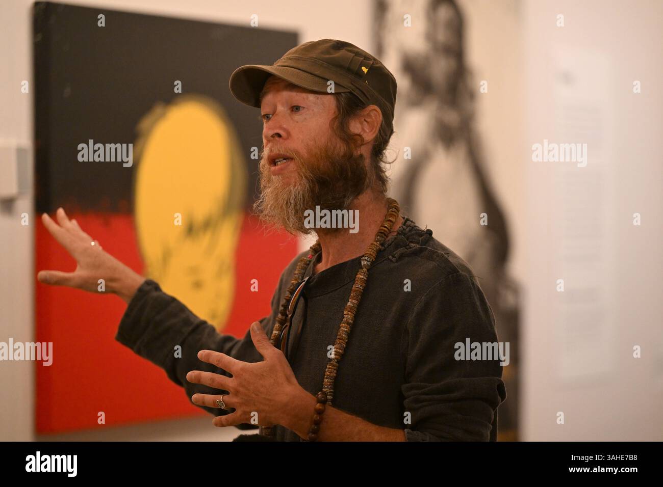 Jason Wing, Aboriginal-Chinese multimedia artist with his artworks ...