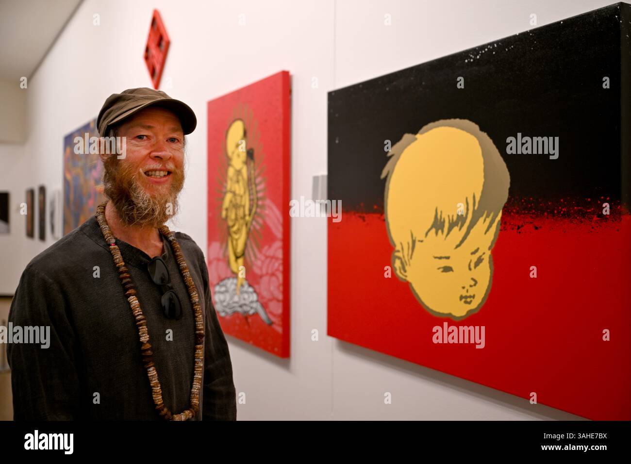 Jason Wing, Aboriginal-Chinese multimedia artist with his artworks ...