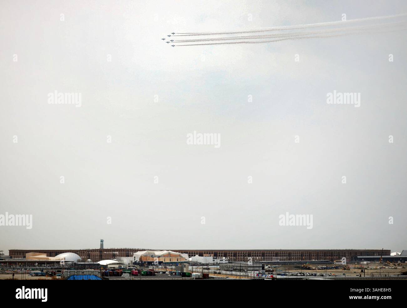Six Blue Impulses aircraft of the Japan Air Self-Defense Force fly over ...