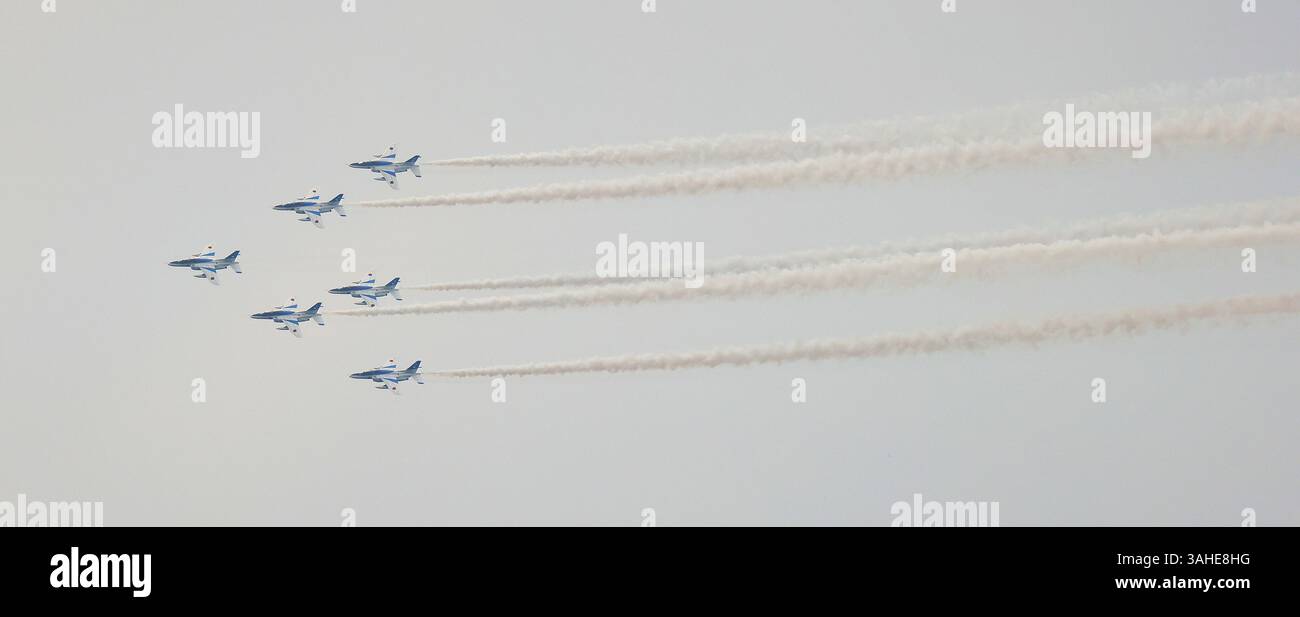 Six Blue Impulses aircraft of the Japan Air Self-Defense Force fly over ...
