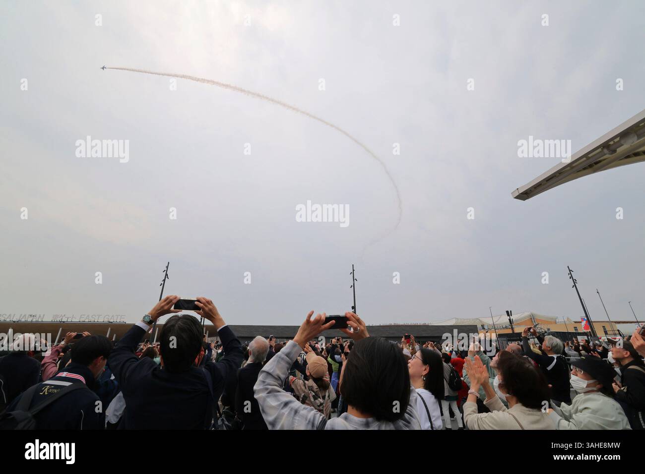 Six Blue Impulses aircraft of the Japan Air Self-Defense Force fly over ...
