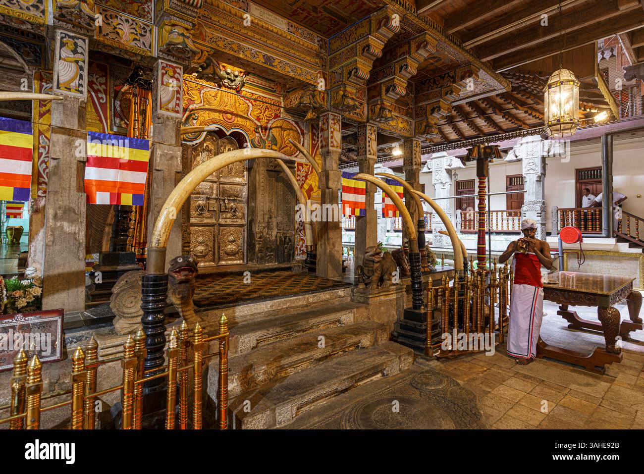 The image showcases the Temple of the Sacred Tooth Relic in Kandy, Sri Lanka, a revered Buddhist ...