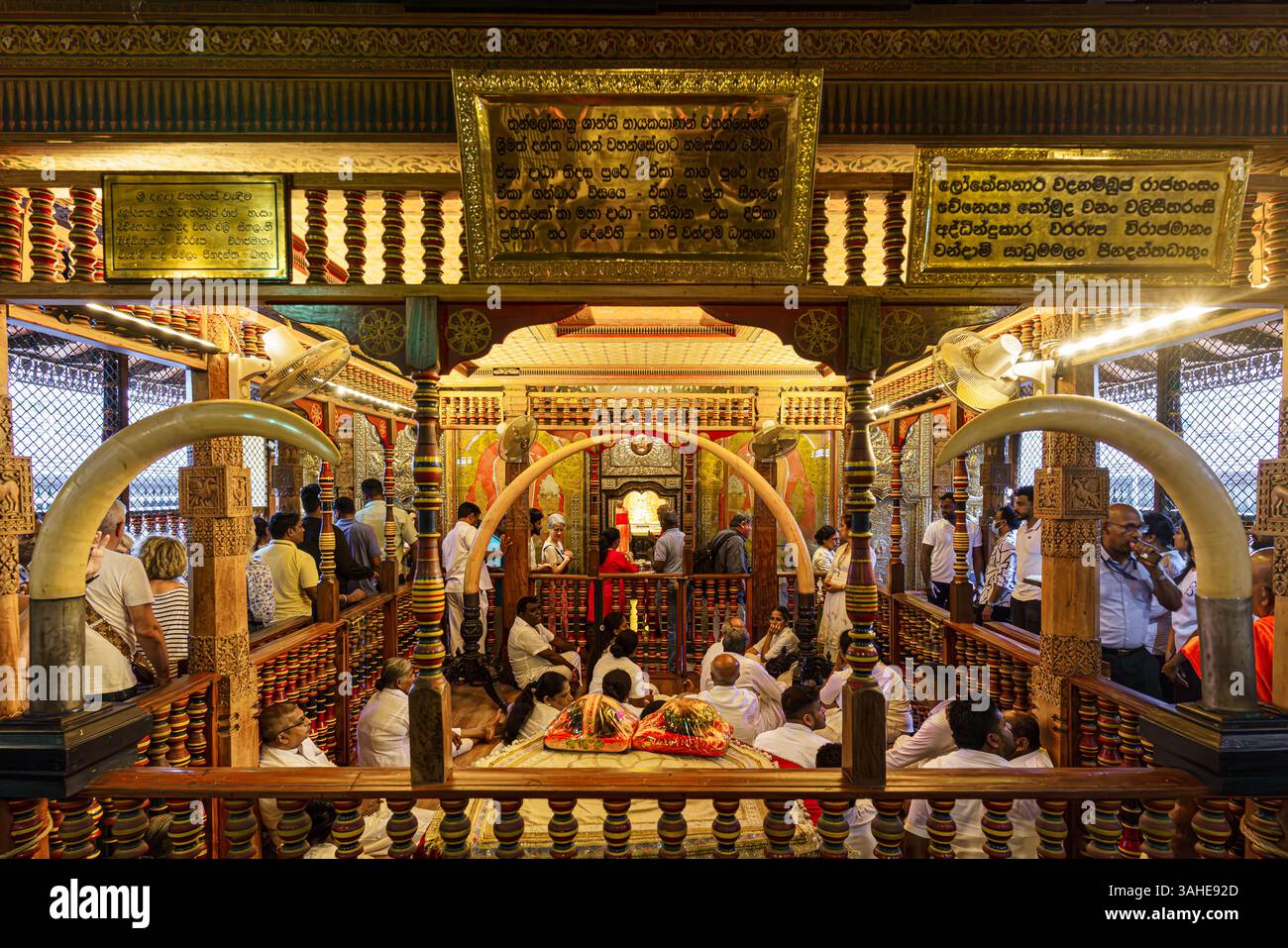 The image showcases the Temple of the Sacred Tooth Relic in Kandy, Sri Lanka, a revered Buddhist ...
