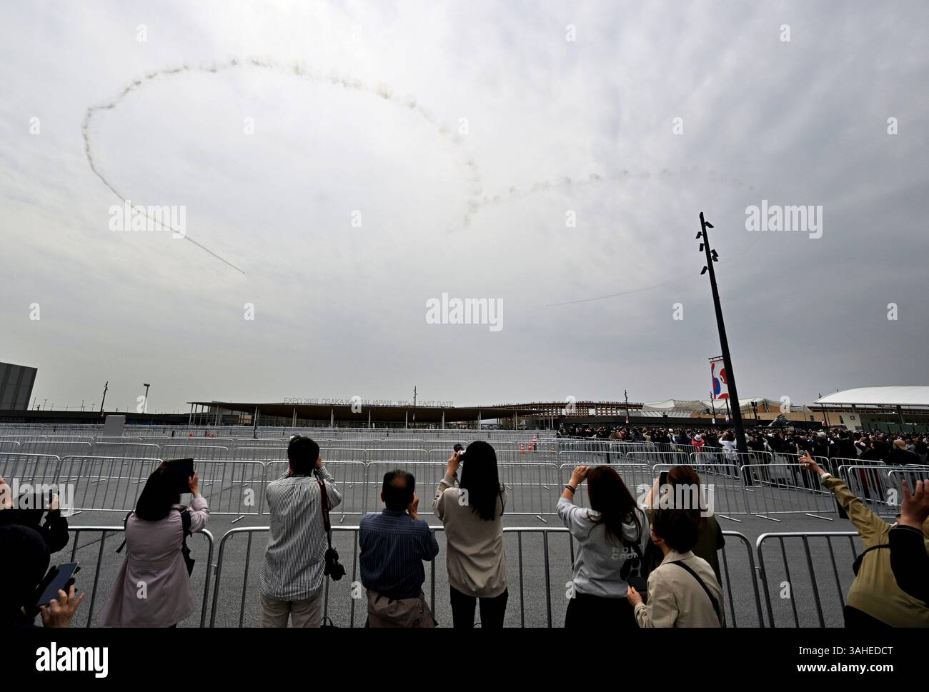 Six Blue Impulses aircraft of the Japan Air Self-Defense Force fly over ...