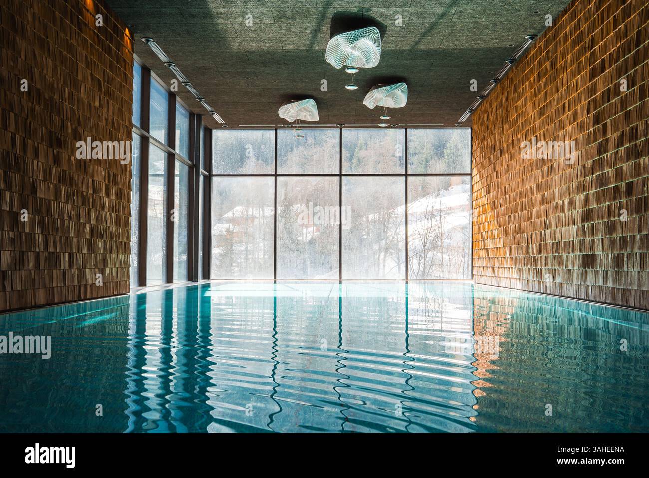 Indoor Luxury Pool with Alpine Views and Wooden Paneling Stock Photo ...
