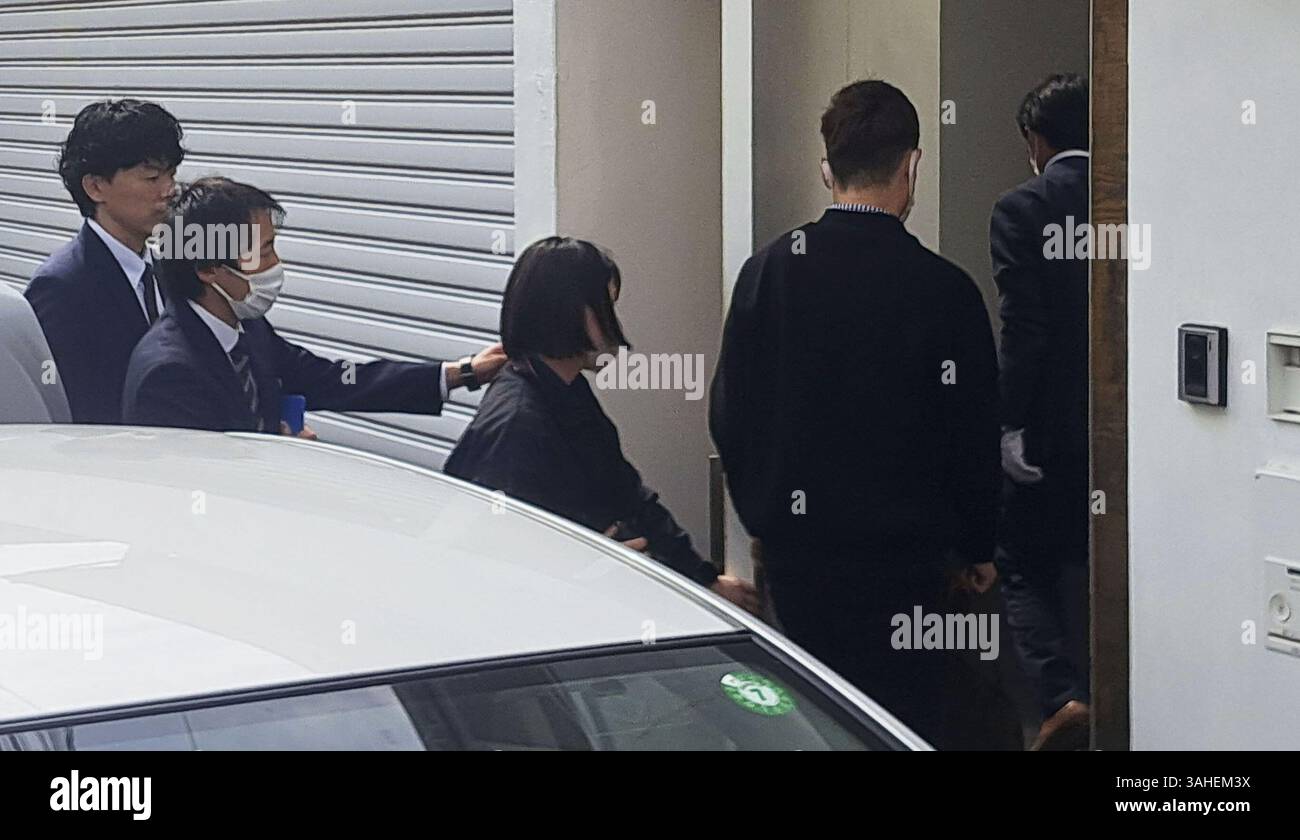 Investigators enter Japanese actor Ryoko Hirosue's house in Tokyo on ...