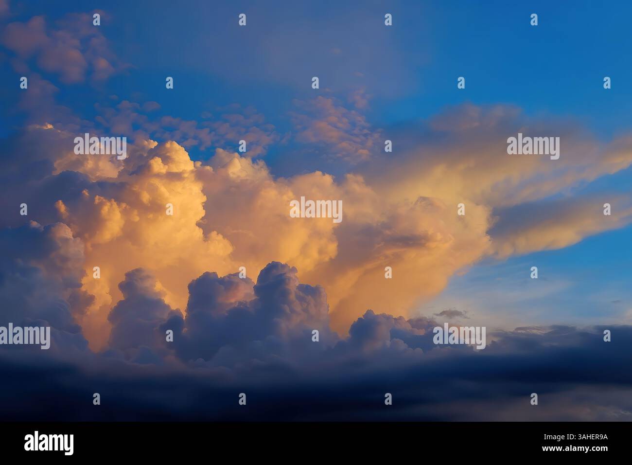 very big rainy cloud with sunlight of afternoon sunshine before heavy ...