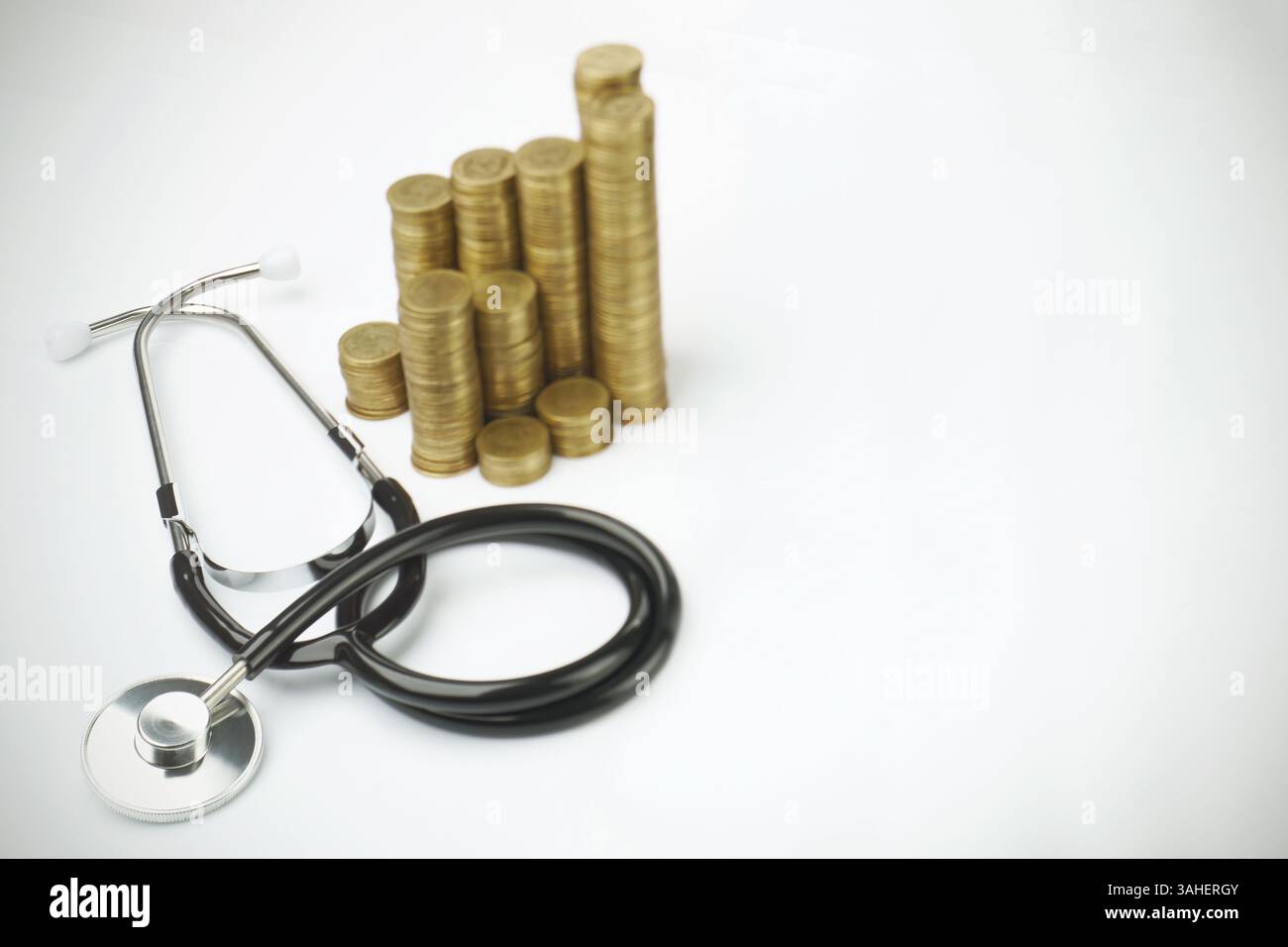 a stethoscope put on background with piles of many column of stacking ...