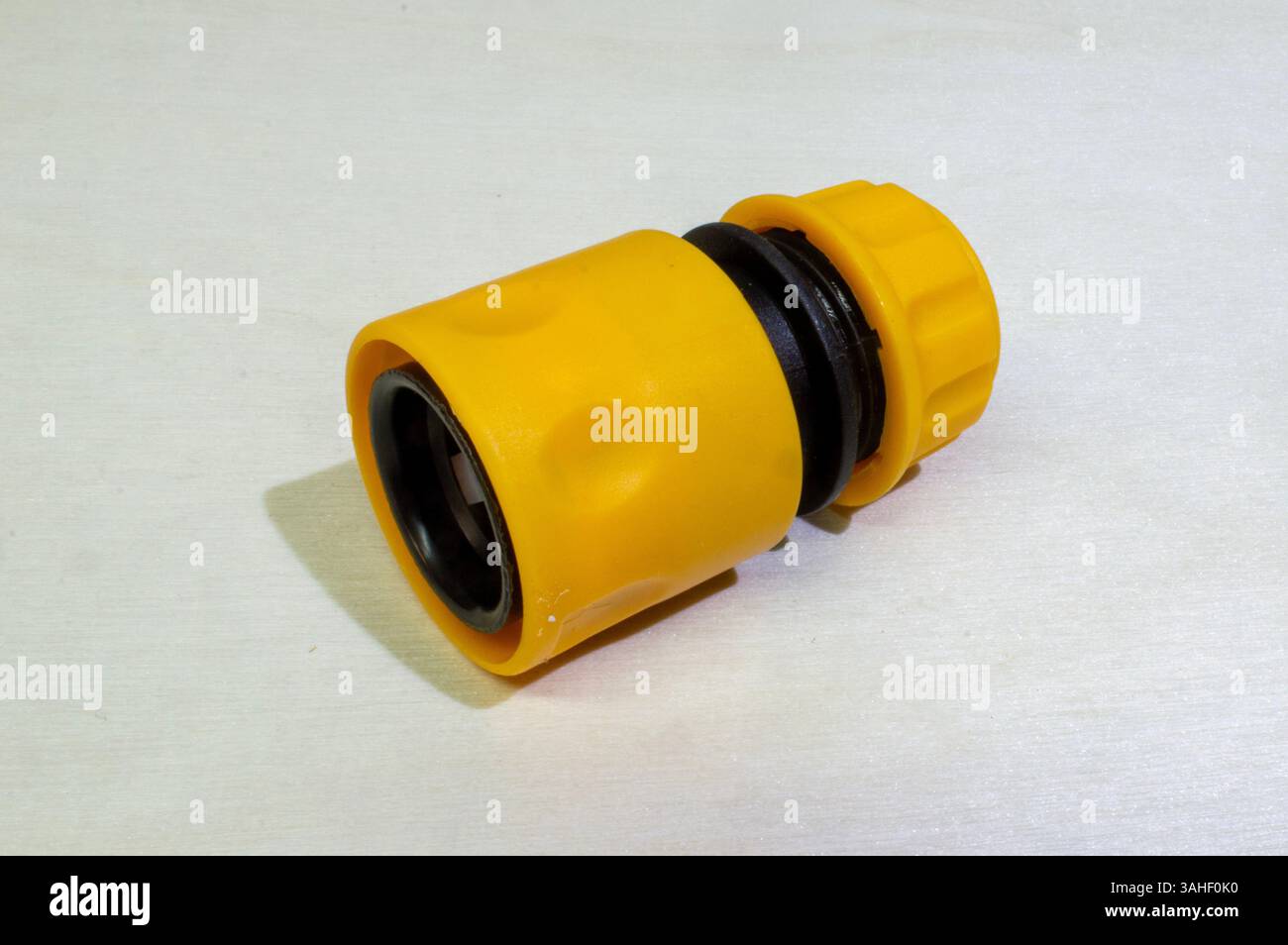 Plastic hose connector Stock Photo - Alamy