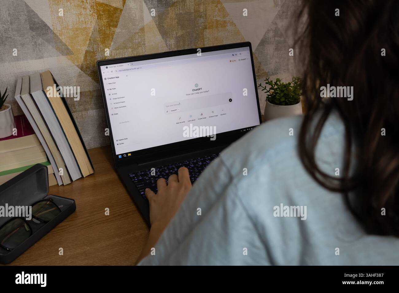 Female typing on keyboard with Chat GPT or AI helping generate ideas on ...