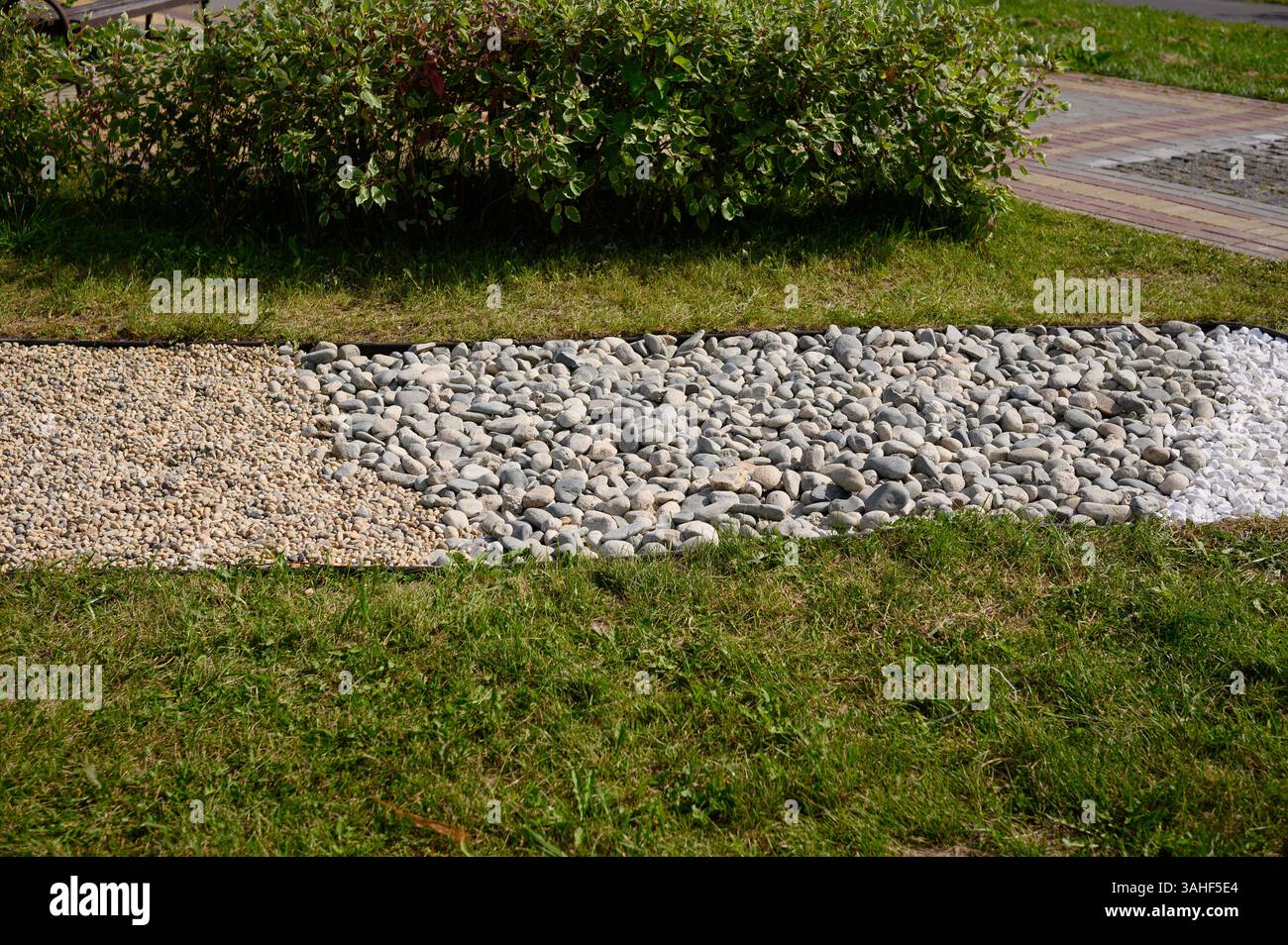 Barefoot path in city park. Eco-path with different tactile textures ...