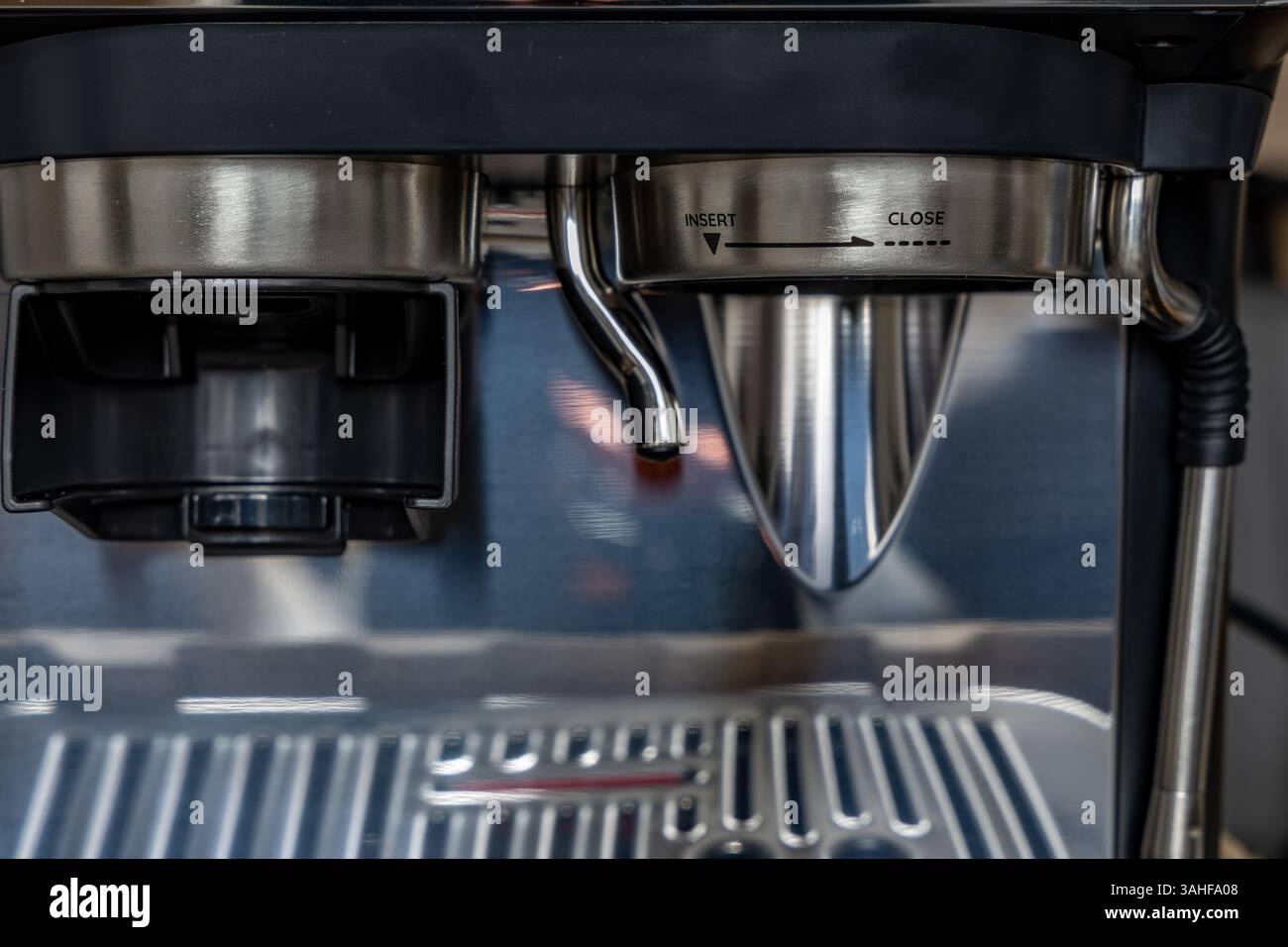 Coffee maker, espresso machine, close-up of the cup and coffee brewing ...