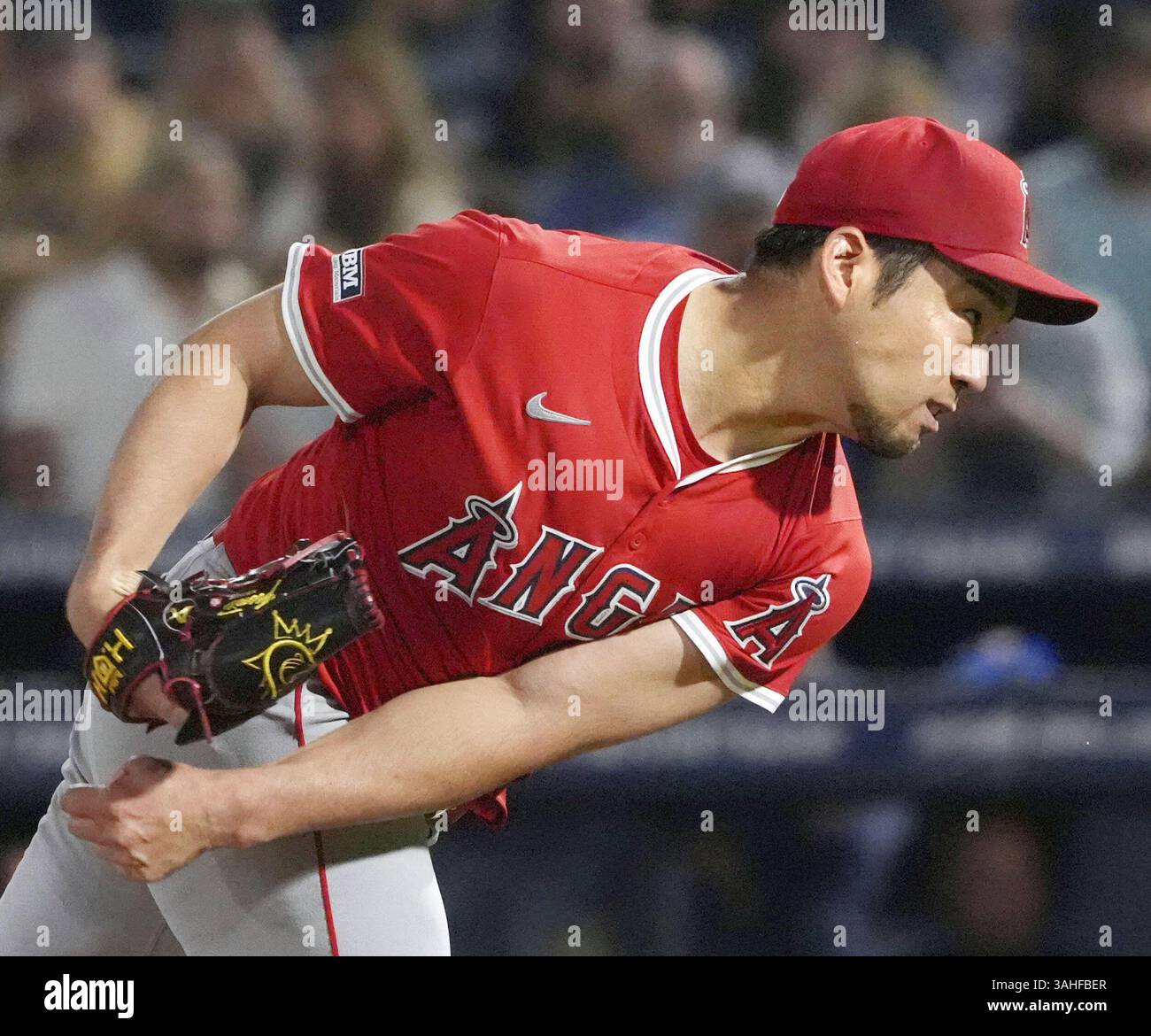 Los Angeles Angels starting pitcher Yusei Kikuchi throws in a baseball ...