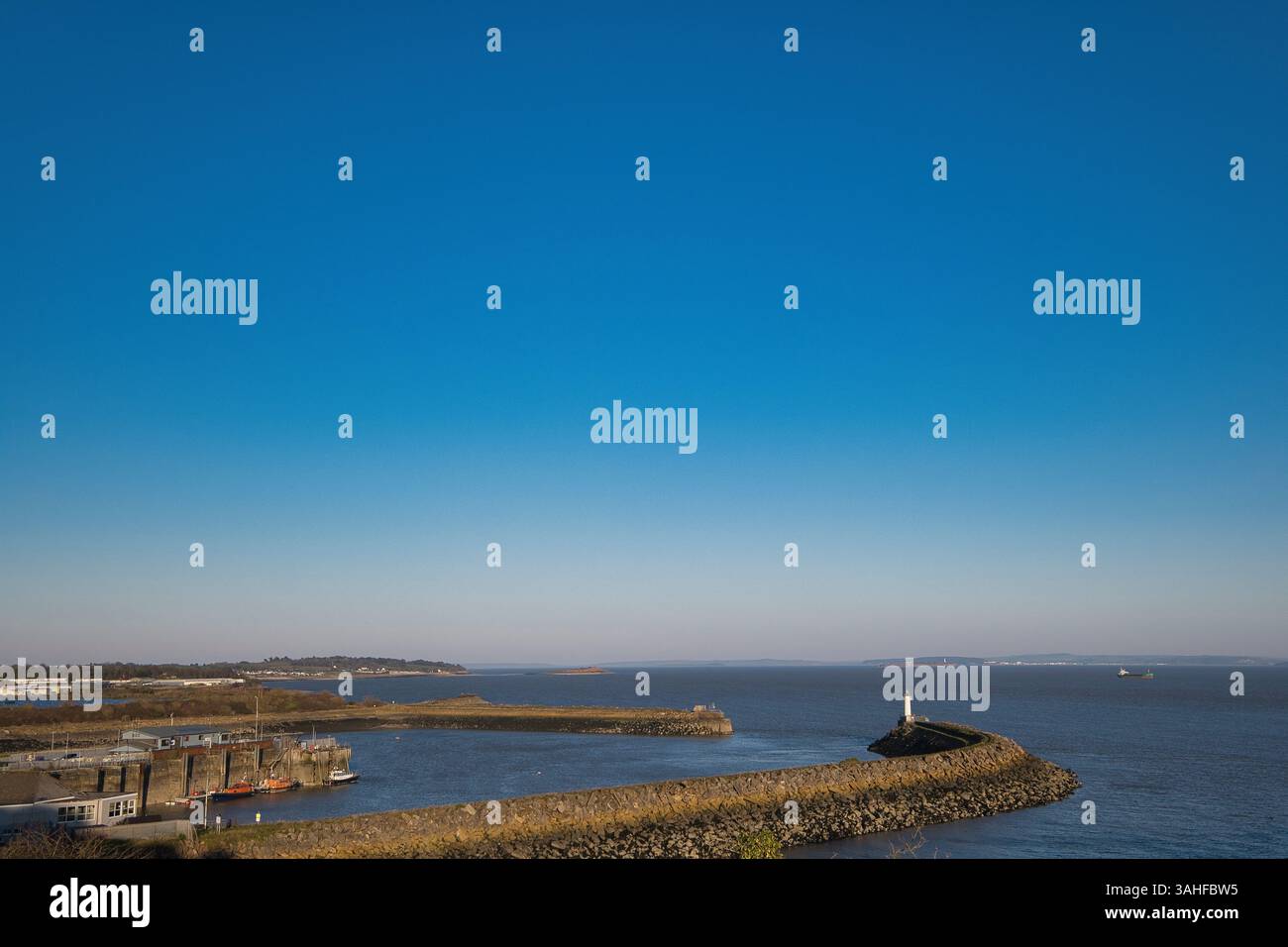 View looking out over Jackson bay and Barry Docks Breakwater Lighthouse ...