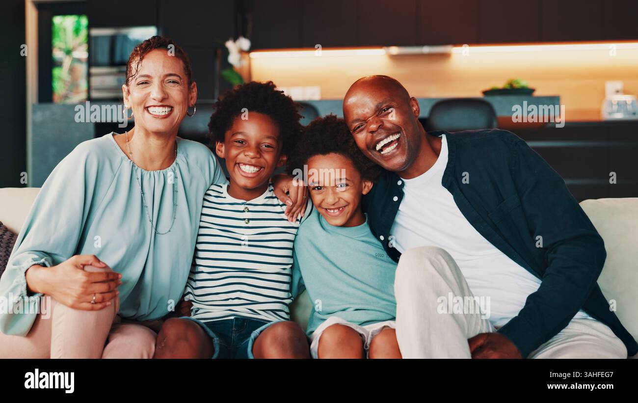 African family, parents and children in portrait on sofa with laughing ...
