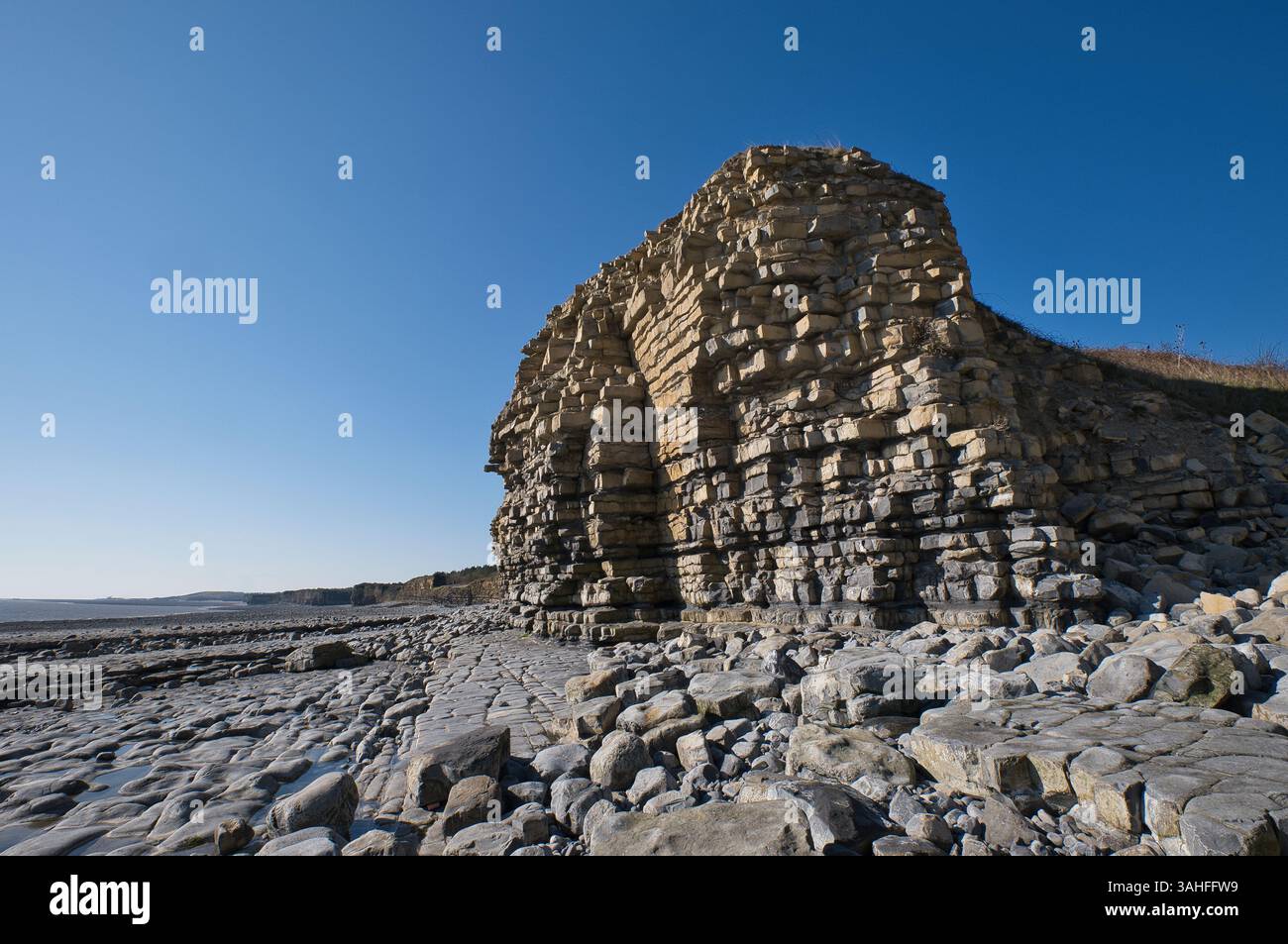 Remains of Limestone cliffs at Rhoose beach dating back to the Jurassic ...