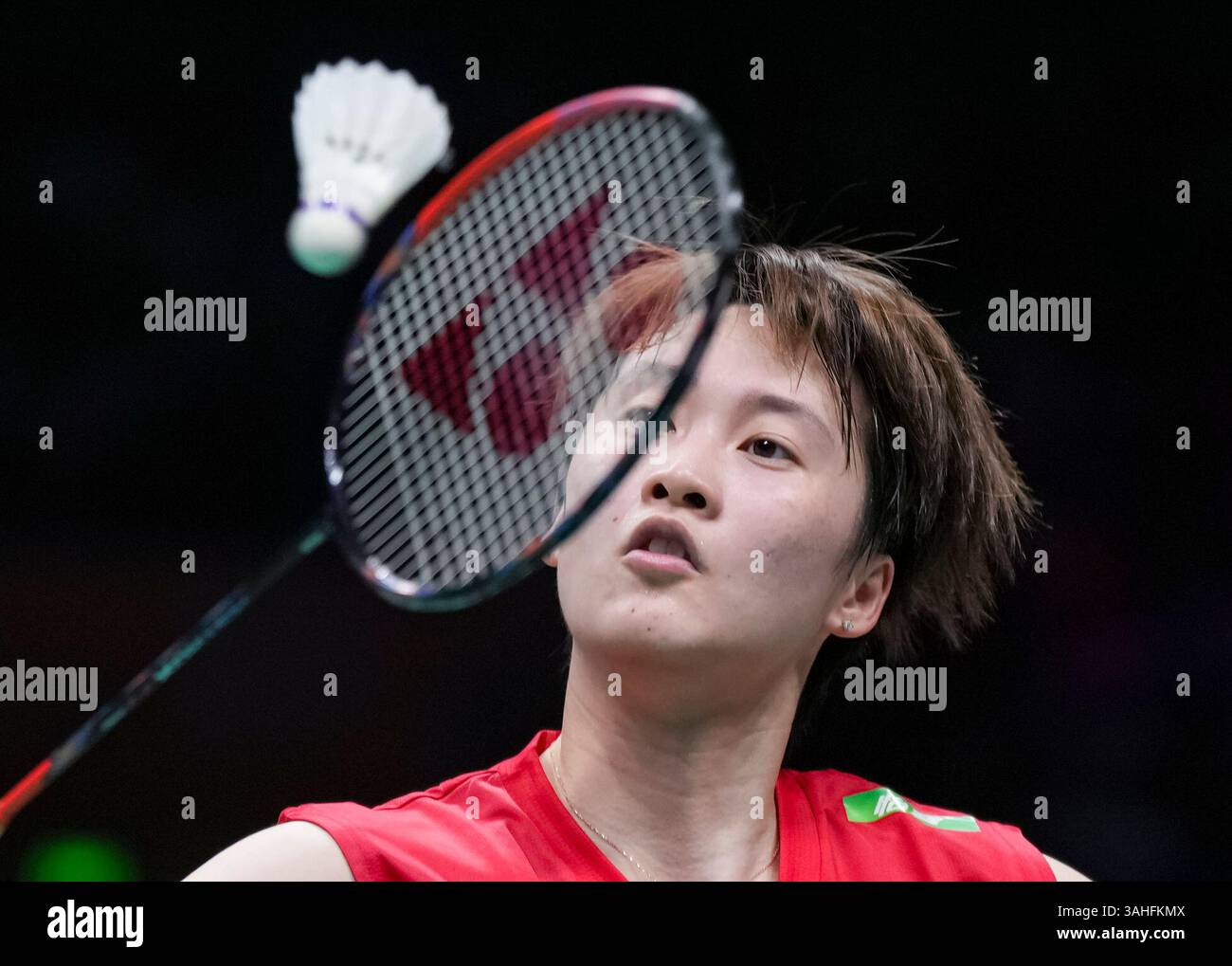 (250410) -- NINGBO, April 10, 2025 (Xinhua) -- Chen Yufei of China hits a return during the ...