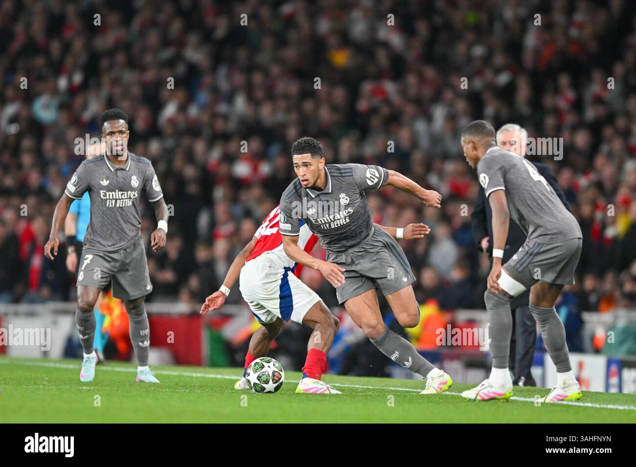 Jude Bellingham of Real Madrid shows his skill in rounding Jurrien ...