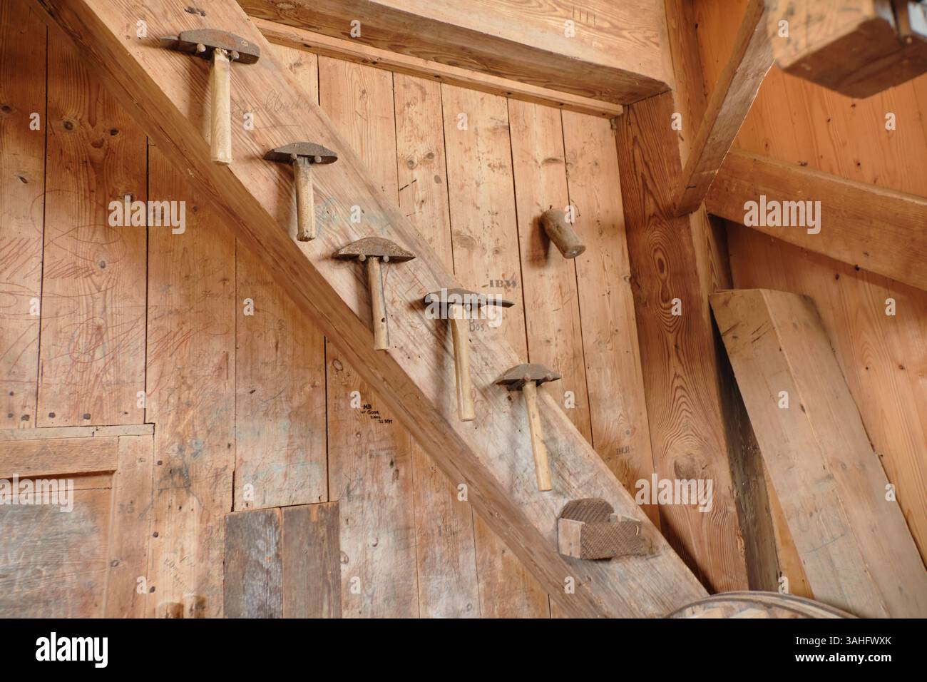 March 10, 2025 - Spijk, Netherlands: Sharpening hammers on a slanted ...